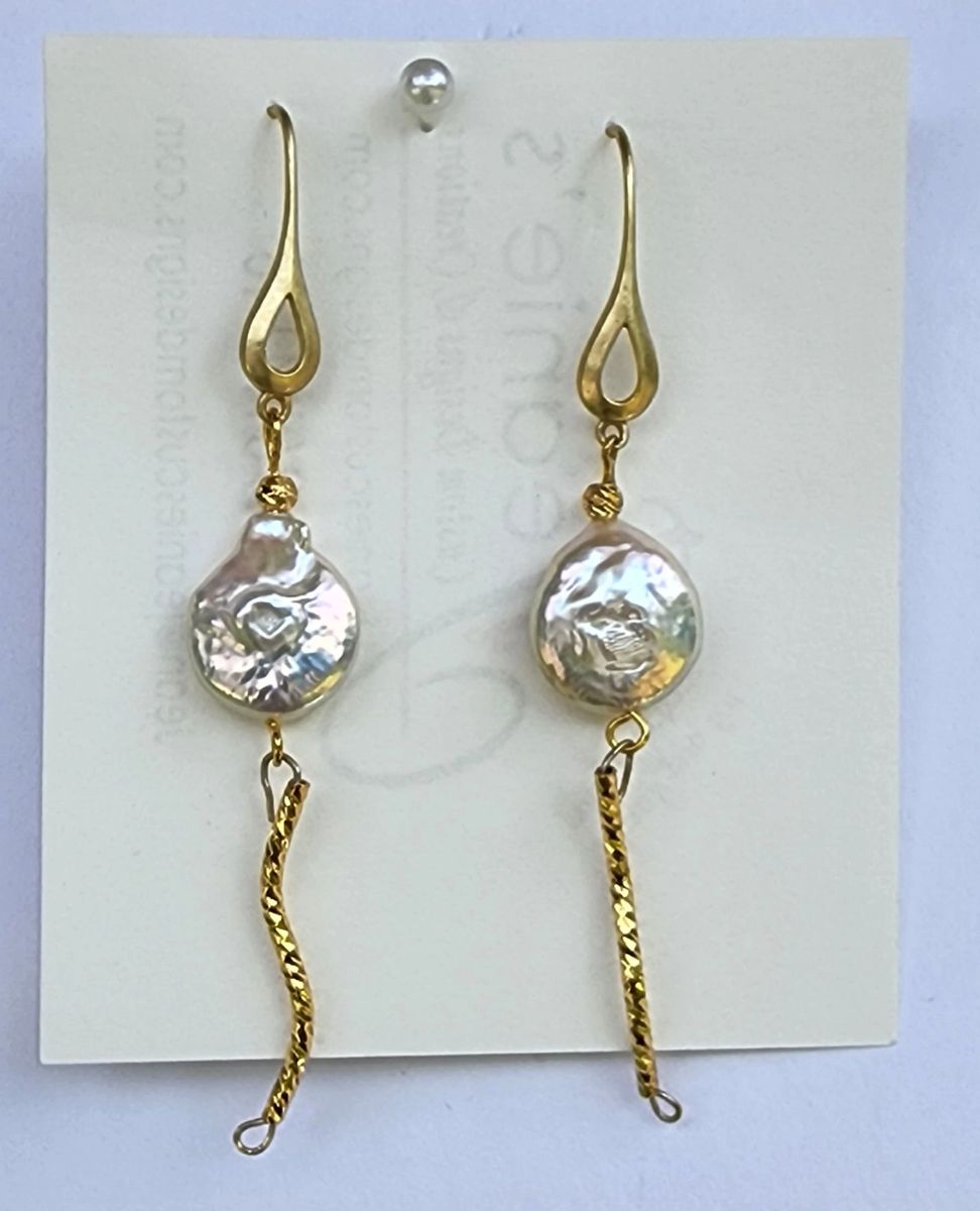 White coin-pearl with gold ear wires in a pear shape with gold twisted ...