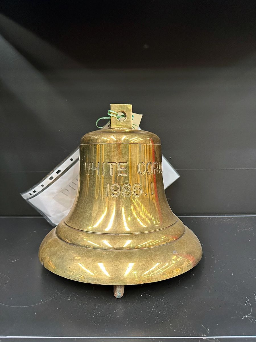 "White Coral" Brass bell from the Pearl of Bahrain ship.