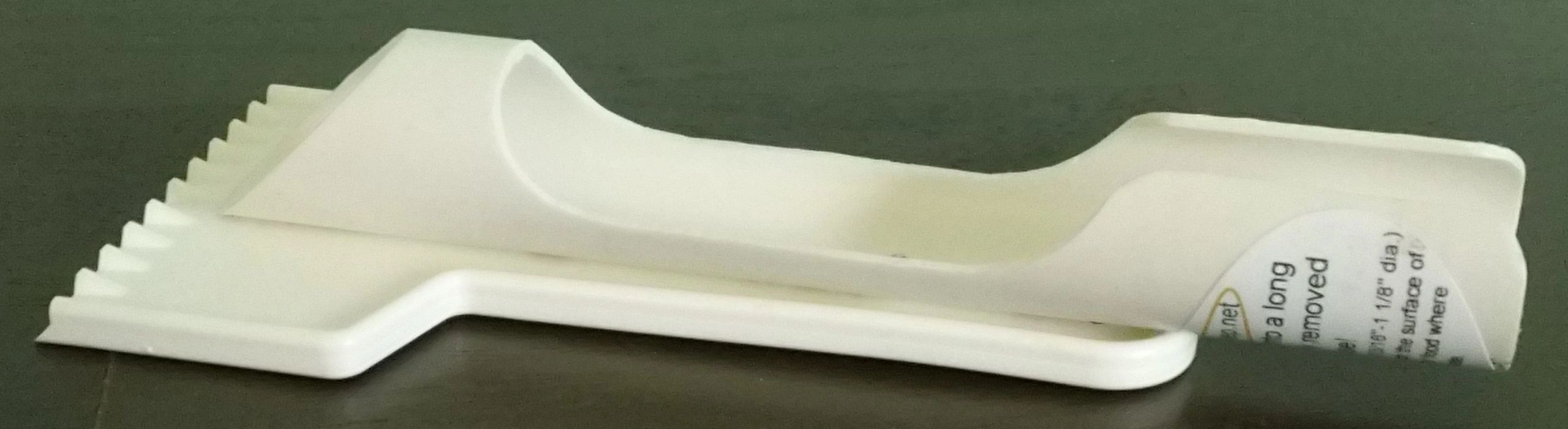 The Scrape & Sweep Broom Handle Attachment