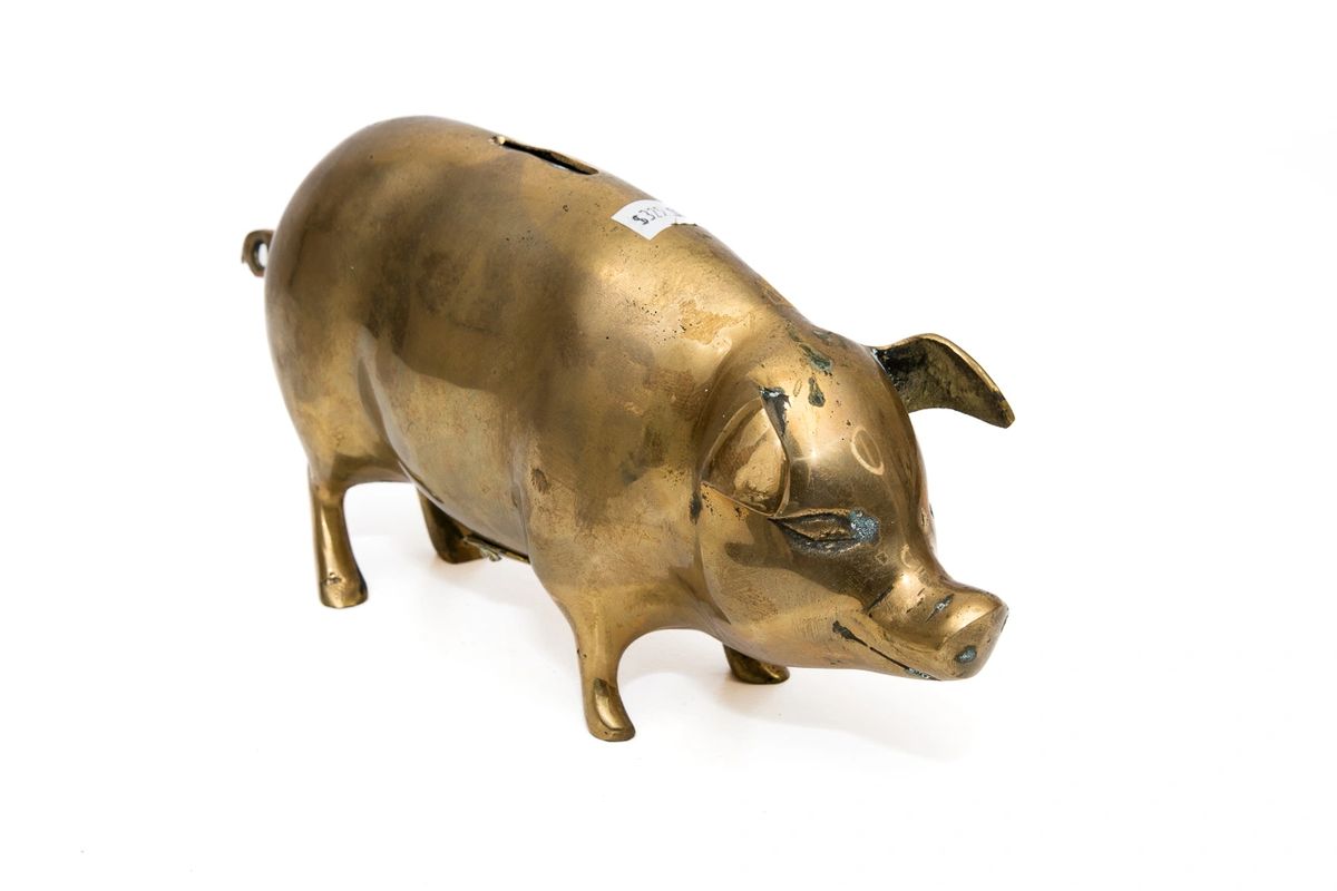 Vintage brass pig shaped piggy bank