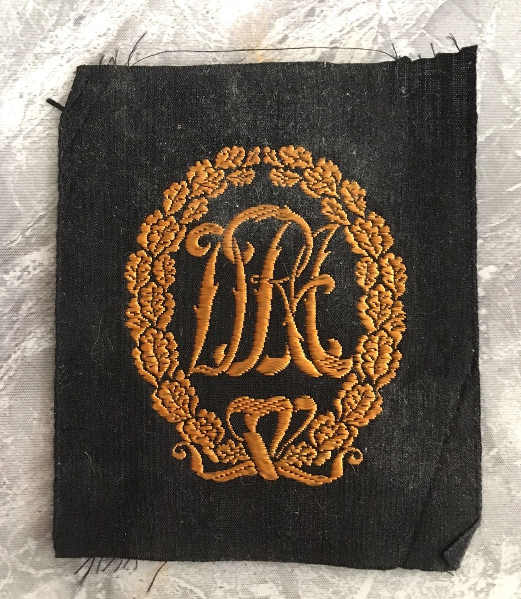 German pre 1935 DRA Cloth Sports badge in Bronze unissued condition