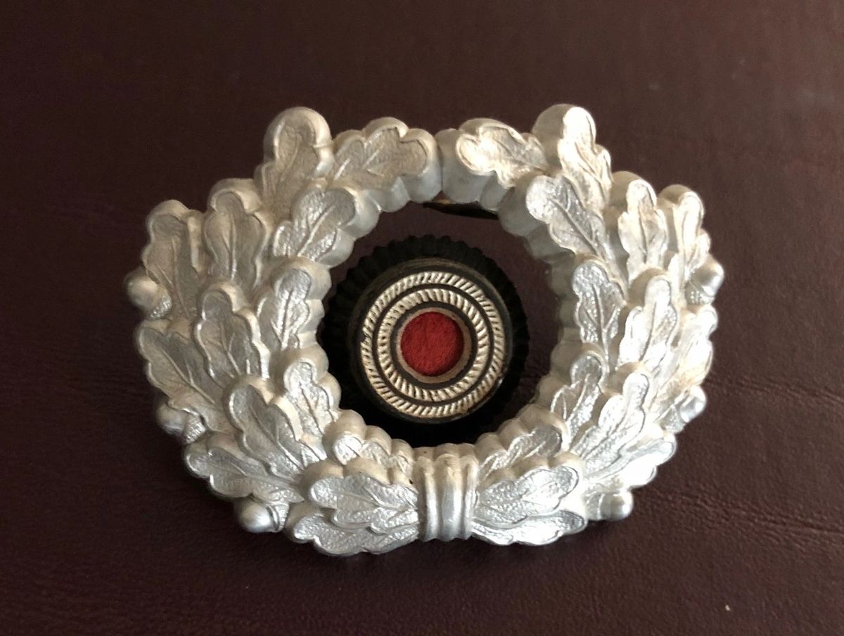 A 2 piece Visor Kockade for the German DRK cap with all pins strong and ...