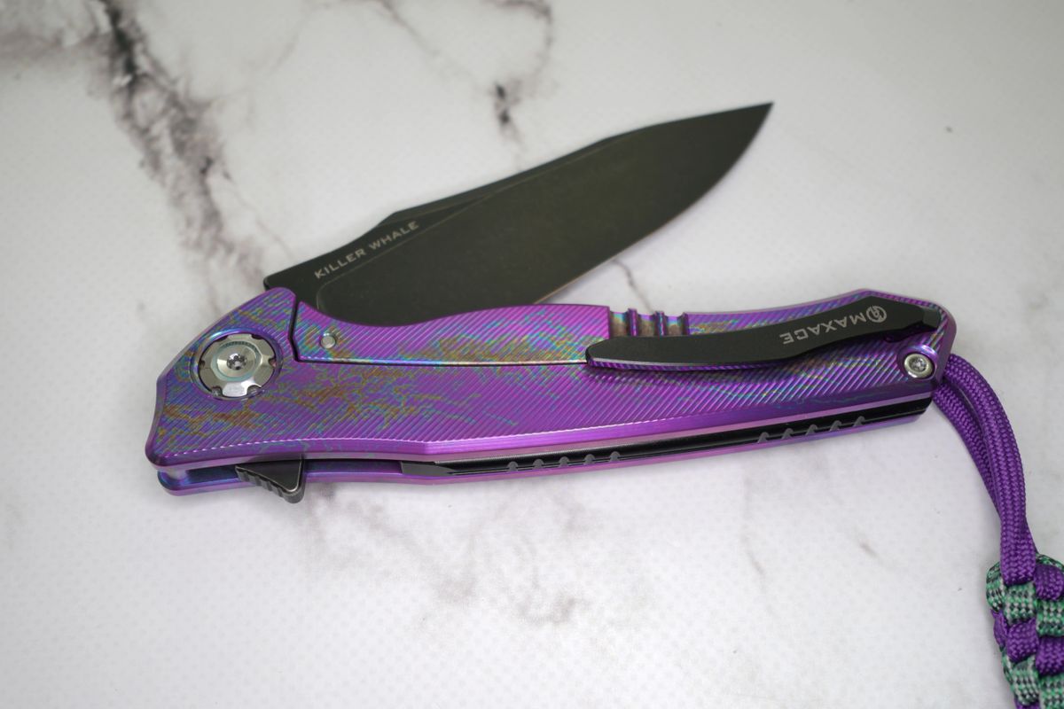 Maxace Killer Whale: The titanium scales have been polished anodized ...