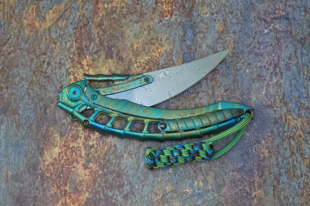 Rike Knife Alien 4: Given a satin finish teal back ground then storm ...