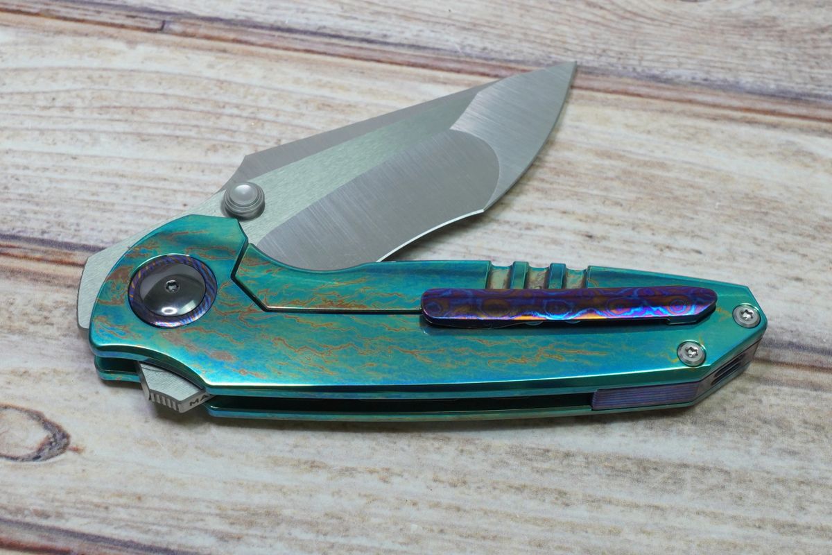Maxace Manticore: Polished and anodized green then given a bronze super ...