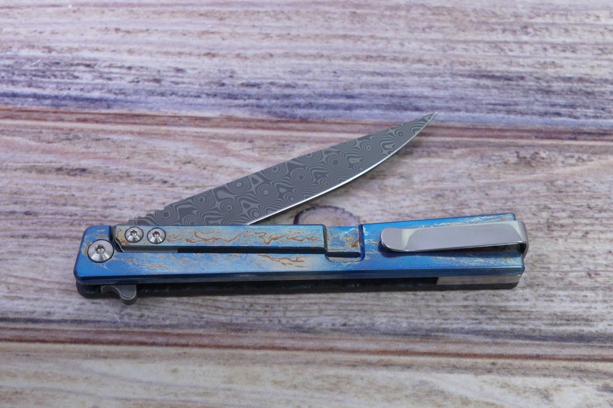 Ocaso Solstice Damascus Blade: Polished and anodized a sky blue then ...