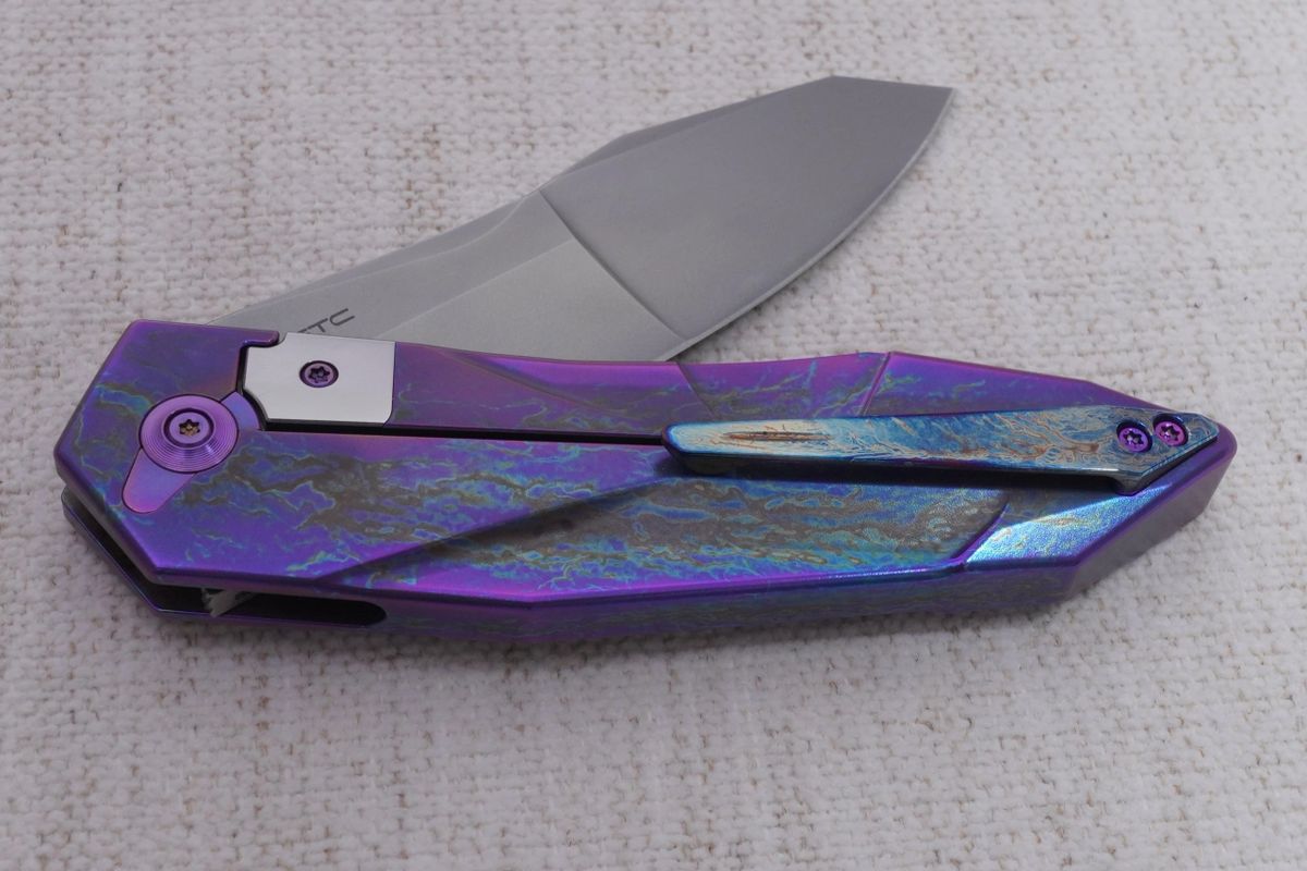 WE Knife Solid: Polished and anodized high voltage purple then super ...