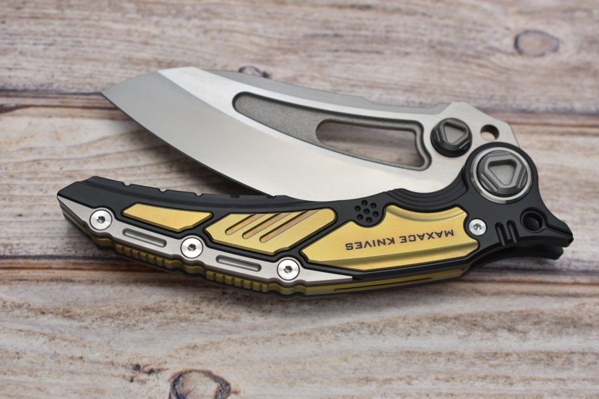 Maxace Titanis: Black DLKC with Golden titanium inlays.