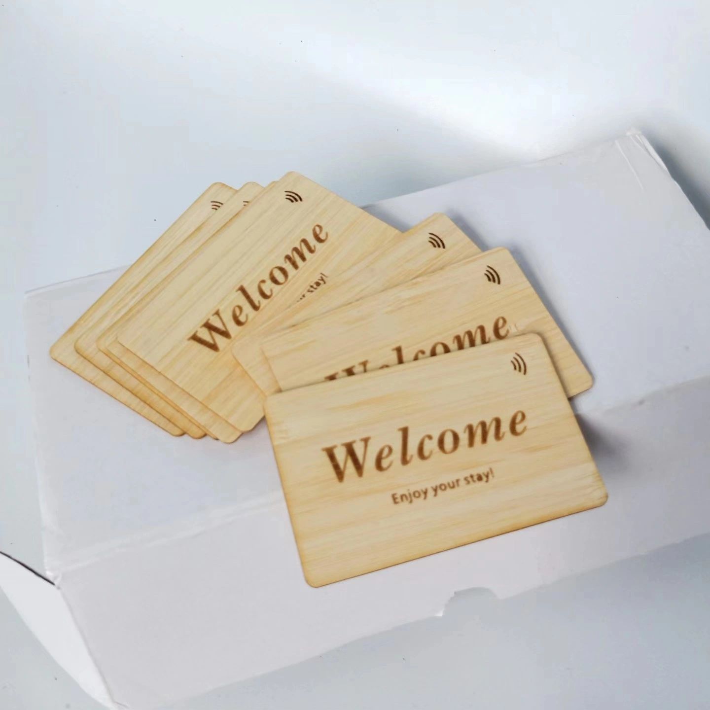 Wooden key card "welcome enjoy your stay!