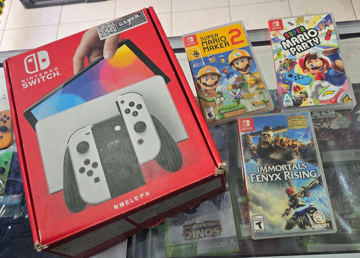 Nintendo Switch Oled usada con 3 juegos