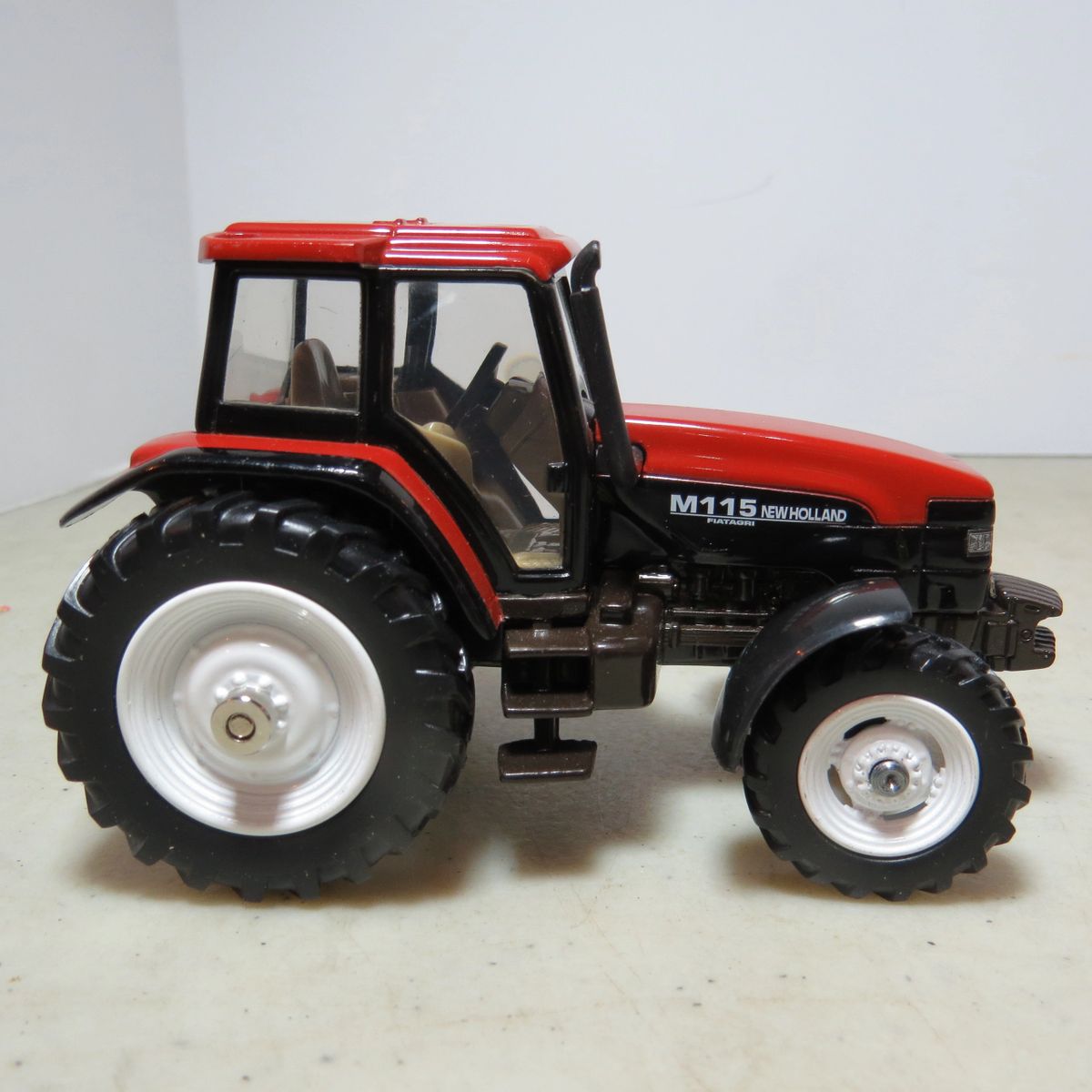 New Holland Model "M115" Tractor, 1/43 scale, NH-3050-1HYR-B