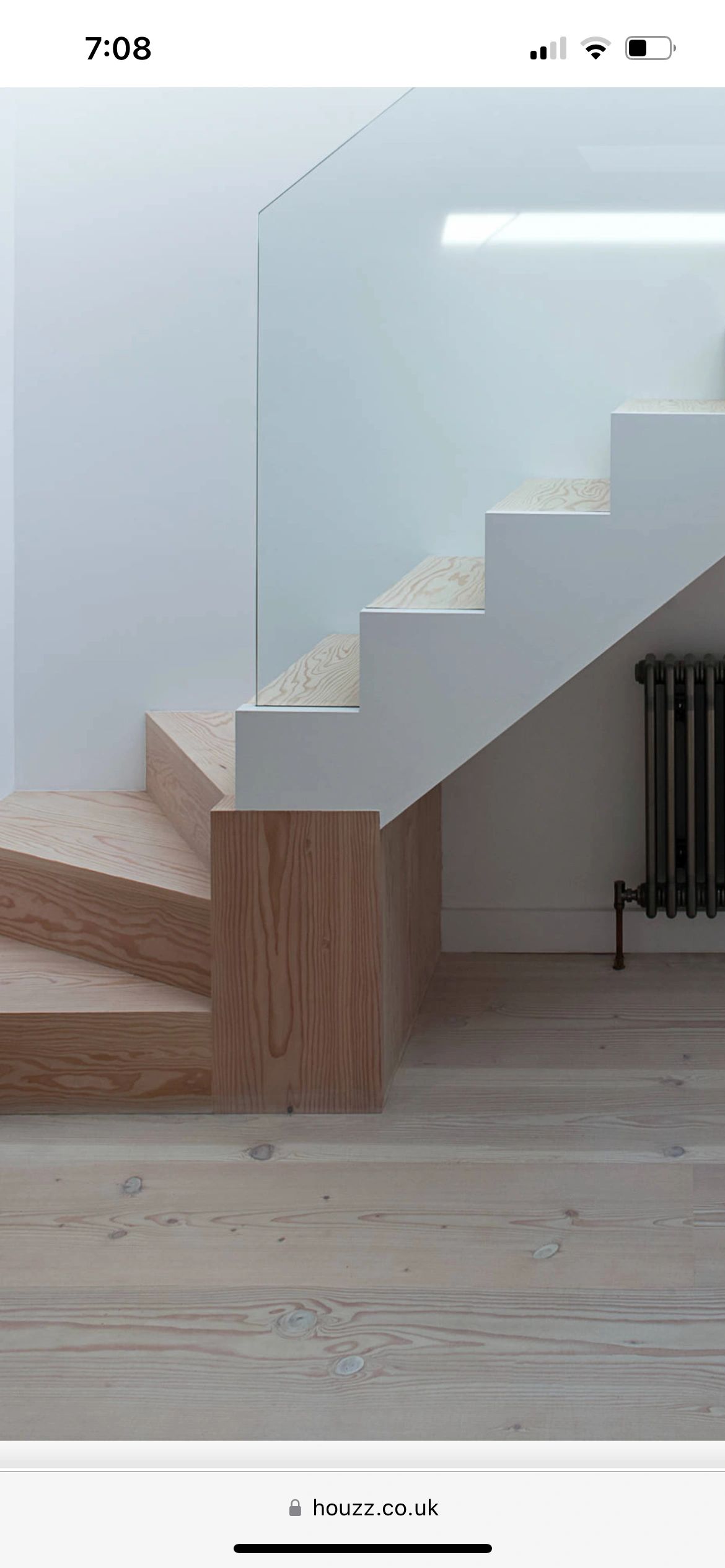 Transforming Open Staircase with Clear Acrylic Panels