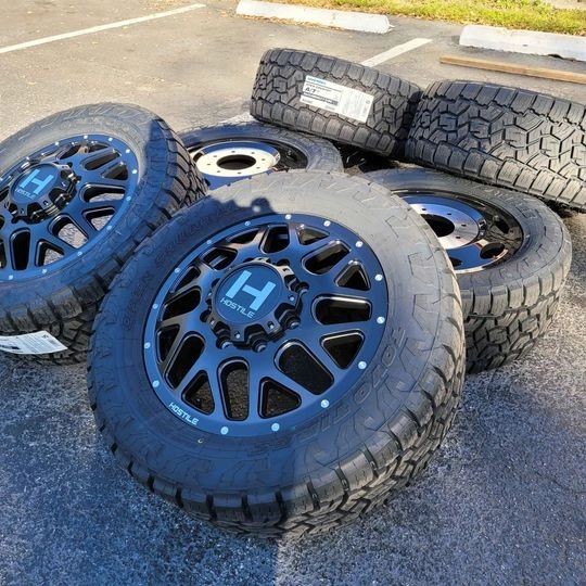 (6) 20" HOSTILE WHEELS AND 33" TOYO AT3 TIRES * CHEVY GMC DUALLY 8x210