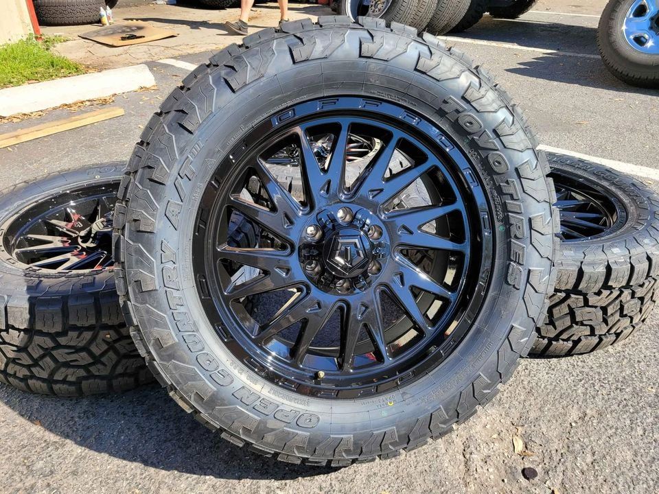 (4) 20" TIS 547B WHEELS AND 33" TOYO AT3 TIRES * SILVERADO F150