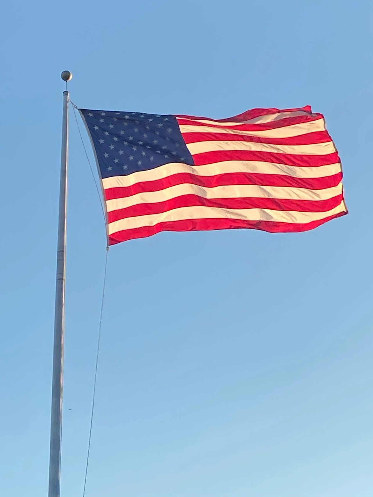 T. Champagne Services - Flagpole, Sign Installation