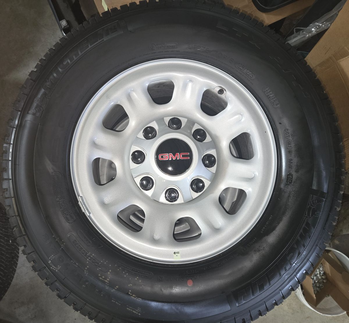 18" GMC 8 lug HD steel painted 8 spoke / MICHELIN LTX AT2, LT275/70R18