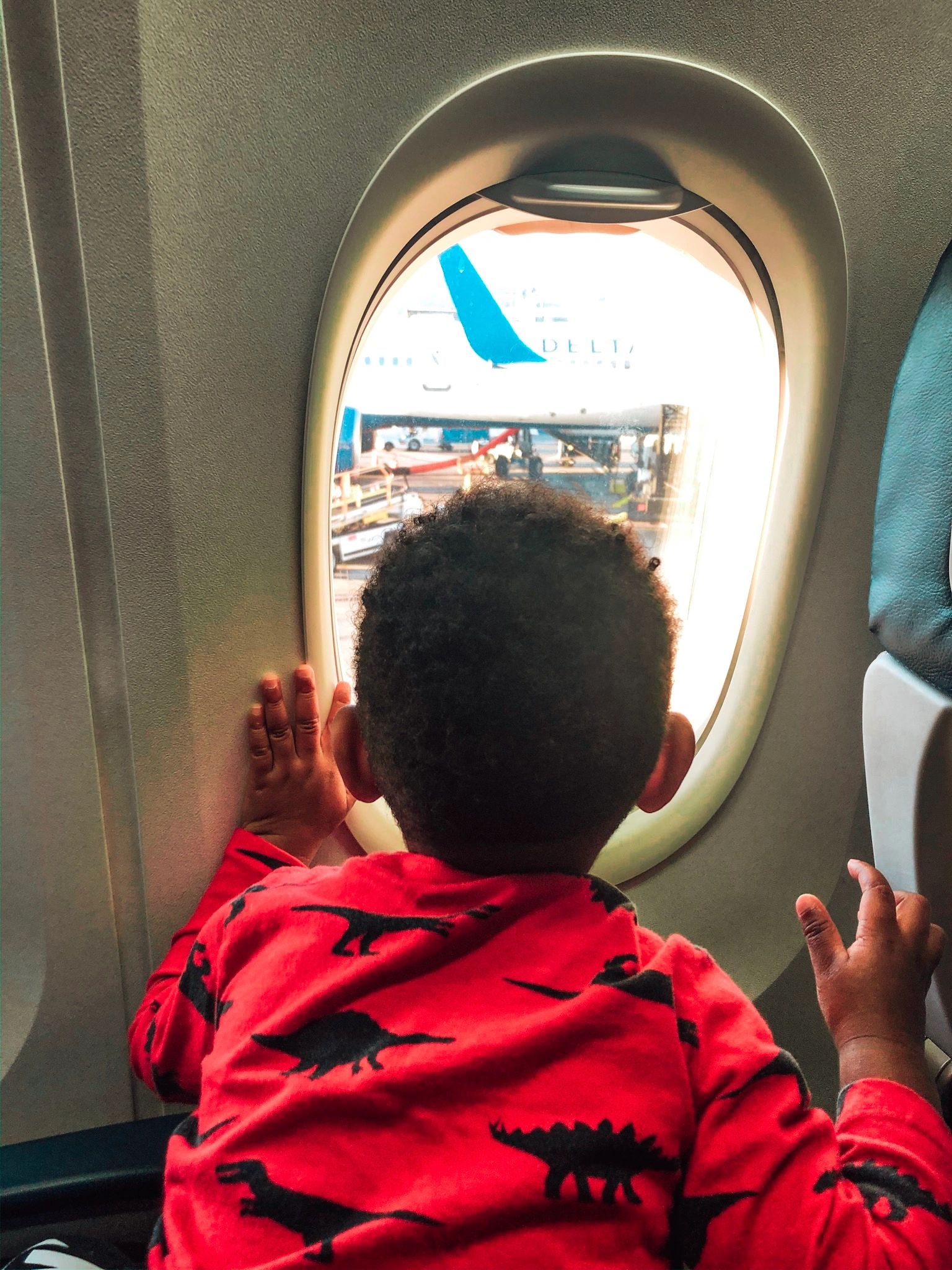 How to Survive Flying with a Lap Toddler