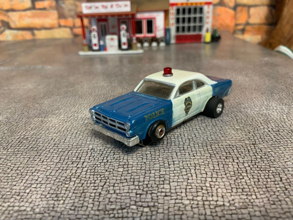 Lowered T-Jet Police Car w/Johnny Lightning Chassis