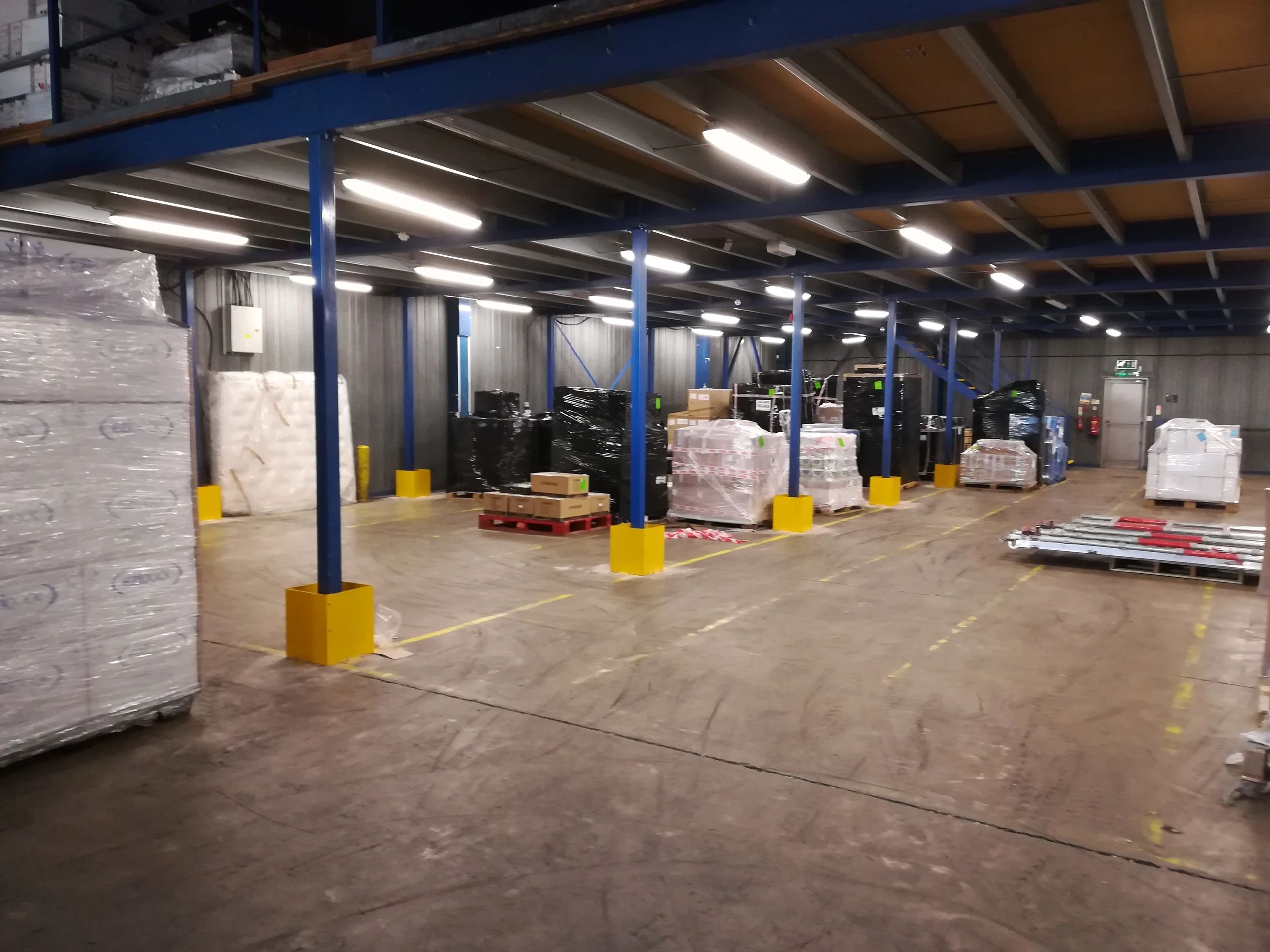 Column guards for mezzanine floor column protection