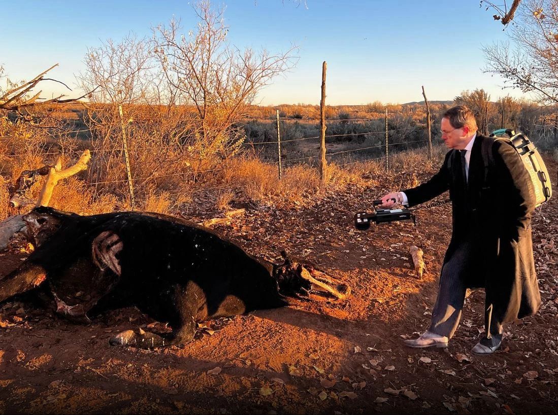 Owner of Skinwalker Ranch examines dead cow