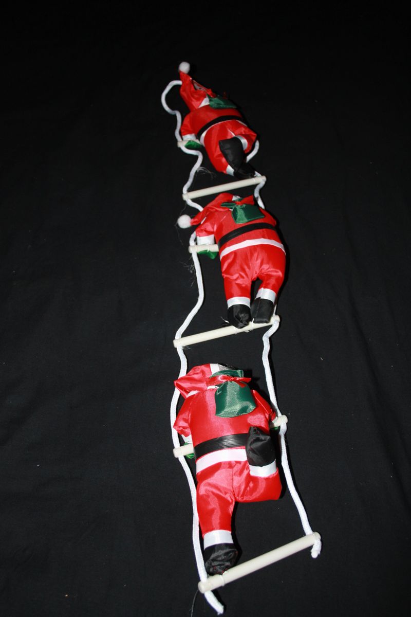 3 X Santas on ladder 90cm long each santa 20cm