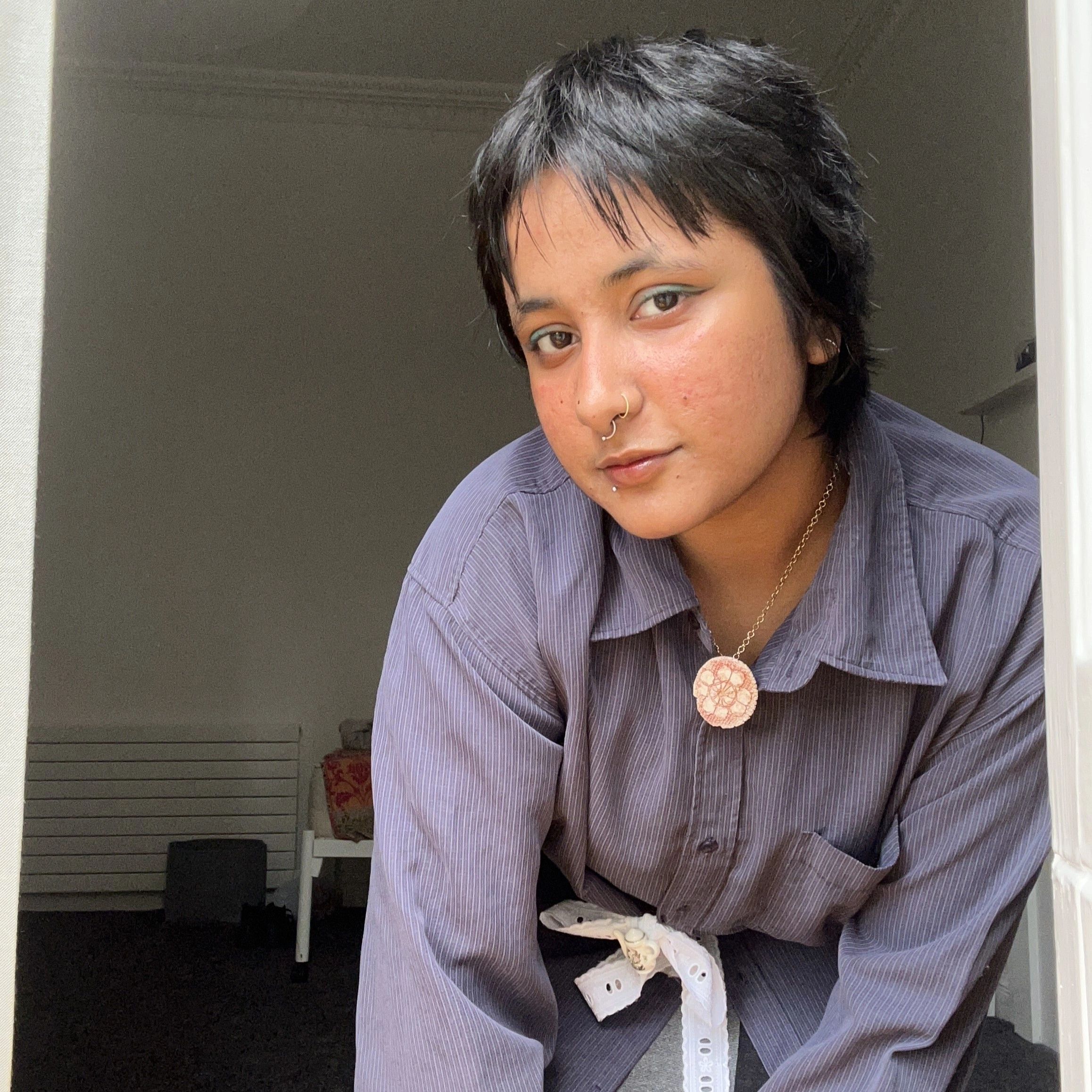 Meet Sharli, a versatile artist who creates enchanting amulets