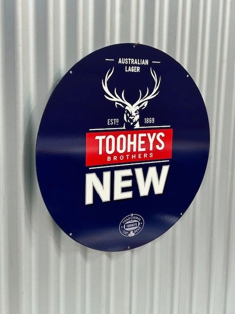 TOOHEYS NEW 560 MM DIAMETER ROUND METAL SIGN