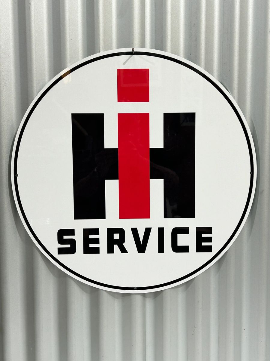 INTERNATIONAL SERVICE 560 MM ROUND METAL SIGN
