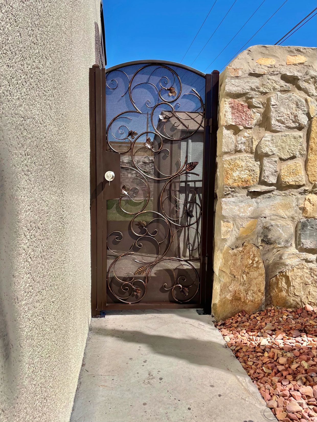 WROUGHT IRON GATE DESIGNS