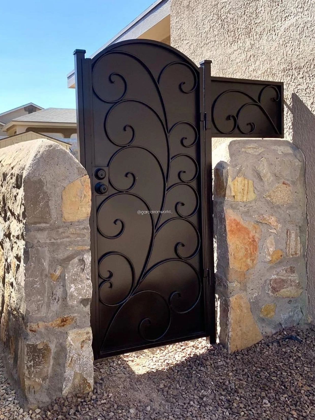 WROUGHT IRON GATE DESIGNS