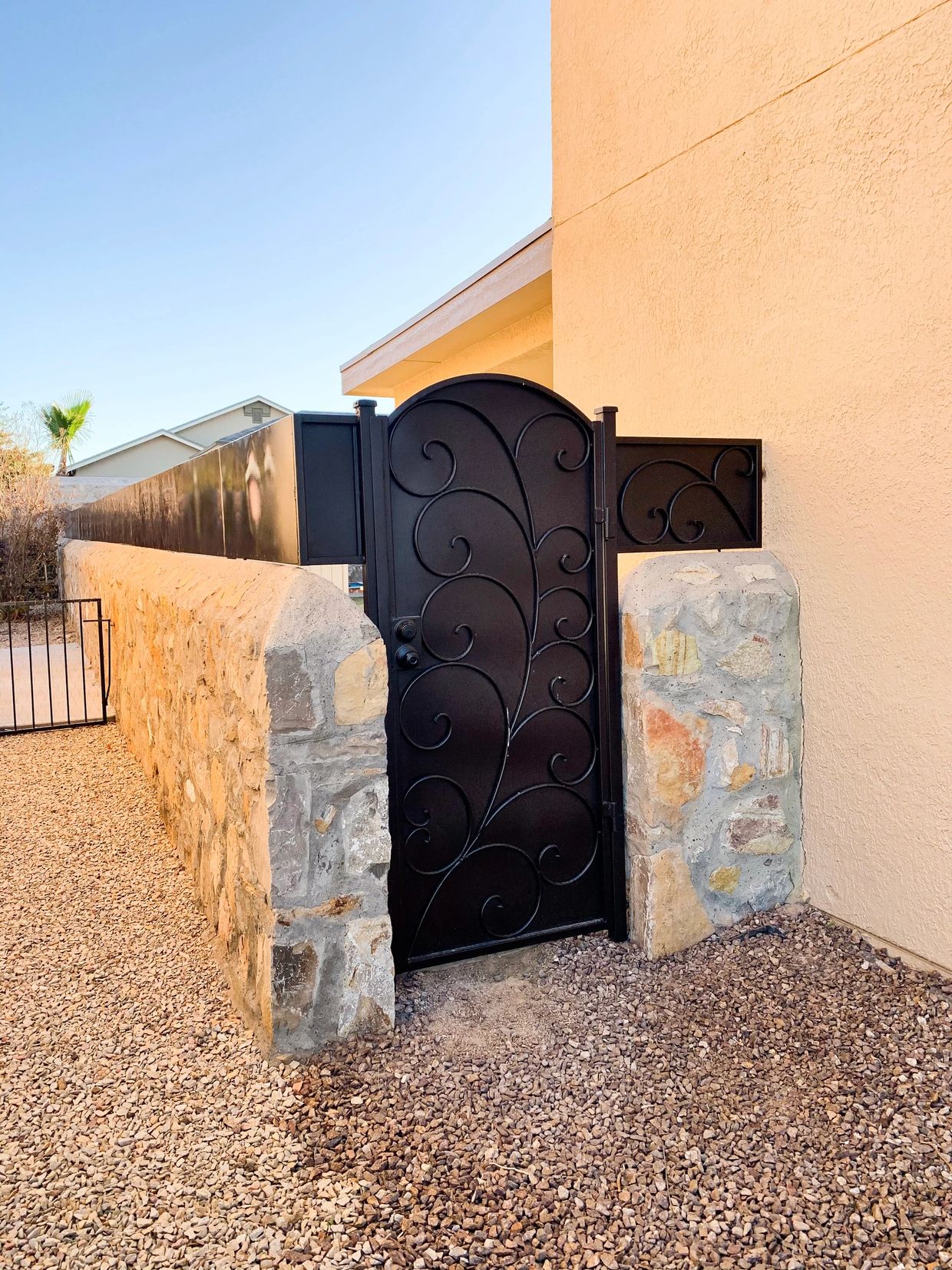 WROUGHT IRON GATE DESIGNS