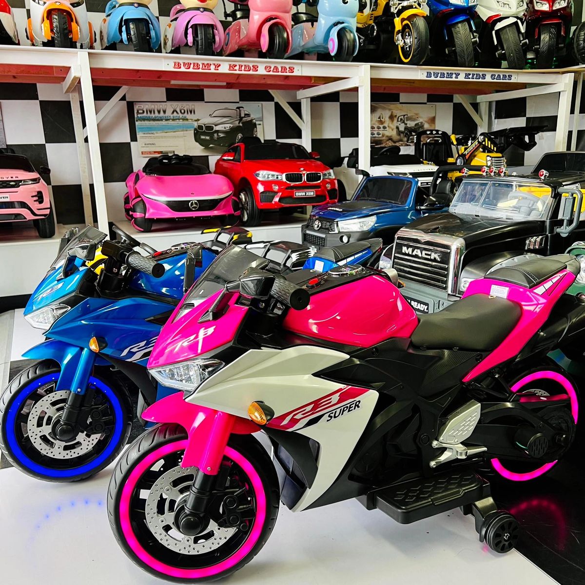 FOR HIRE: DUO 12V Blue & Pink Electric Kids Ride On Motorbikes