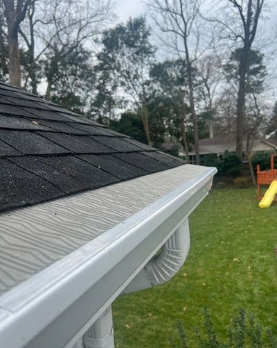 SEAMLESS GUTTERS & GUTTER GUARDS