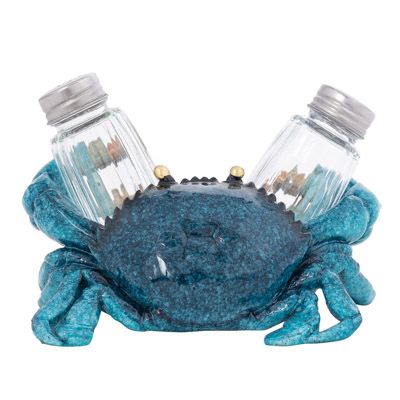 Crab with salt and pepper shakers
