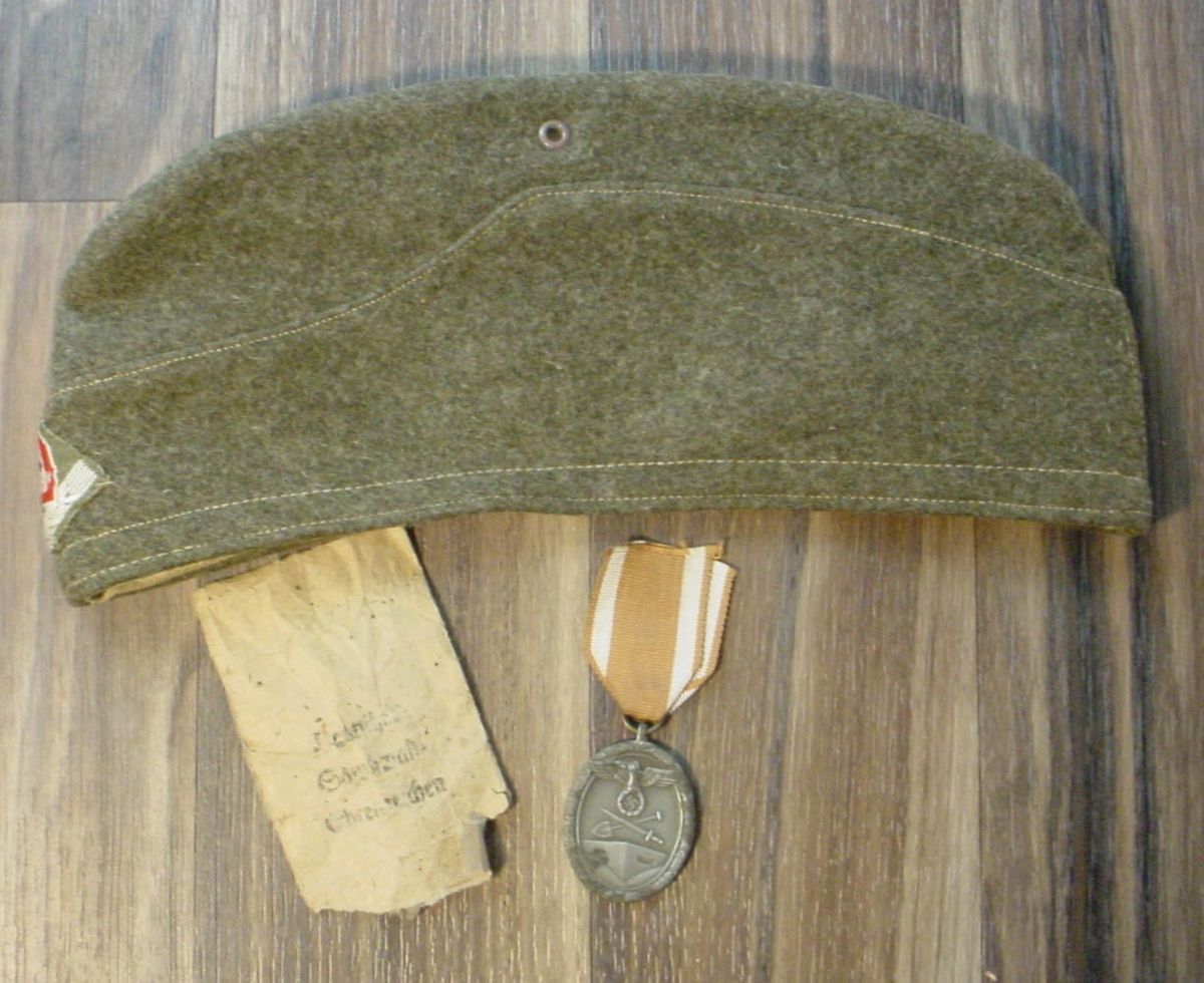 SOLD - WWII GERMAN RAD OVERSEAS HAT WITH WEST WALL MEDAL, Item #4145