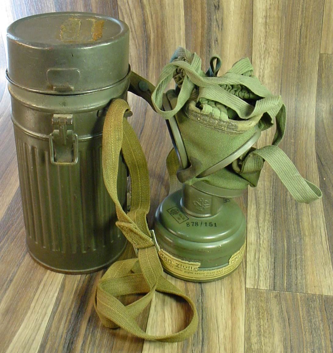 SOLD - WWII GERMAN ARMY GAS MASK WITH CONTAINER AND STRAPS, Item #4380