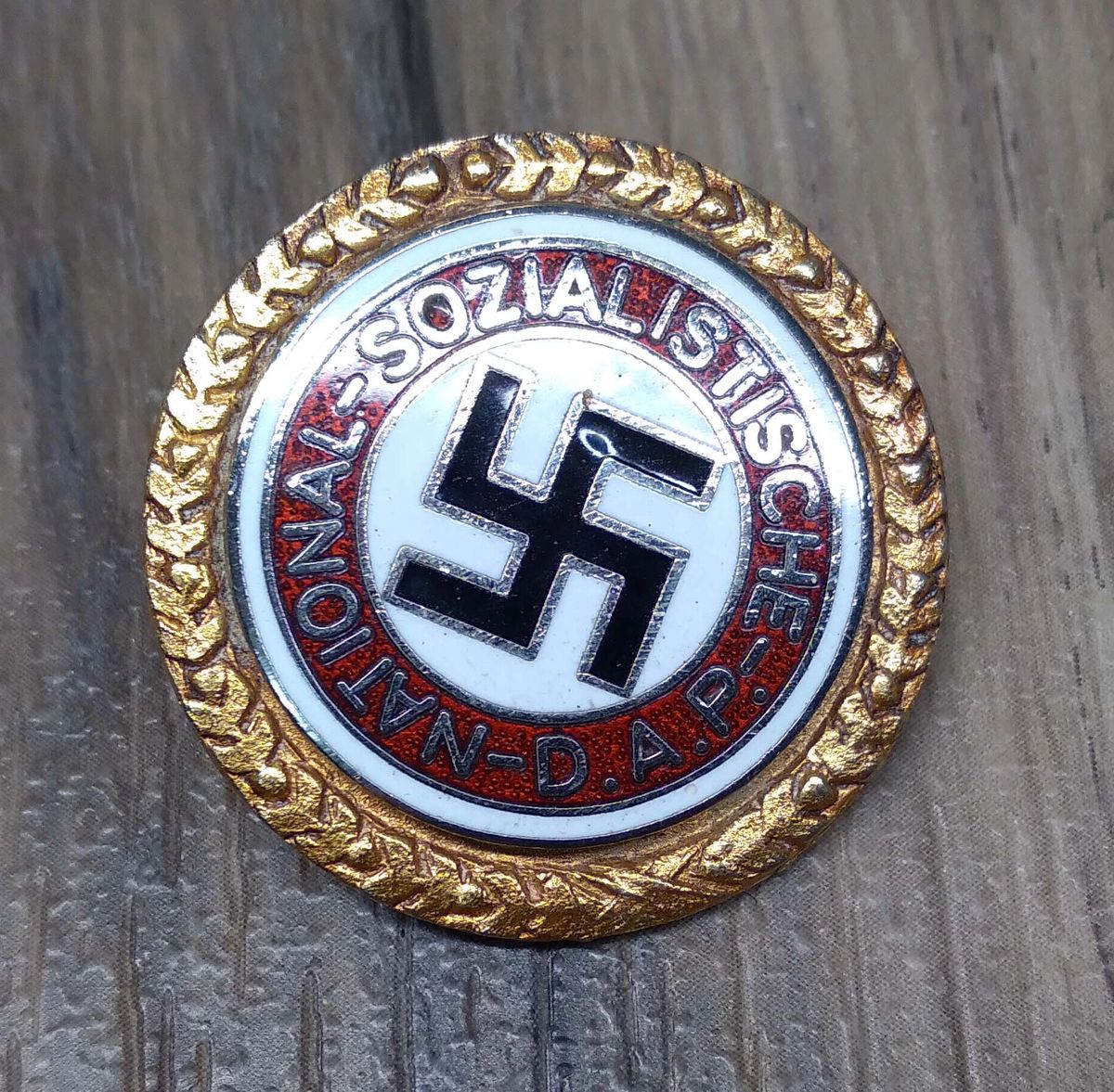 SOLD - REPRODUCTION WWII GERMAN GOLD PARTY BADGE, Item #6479
