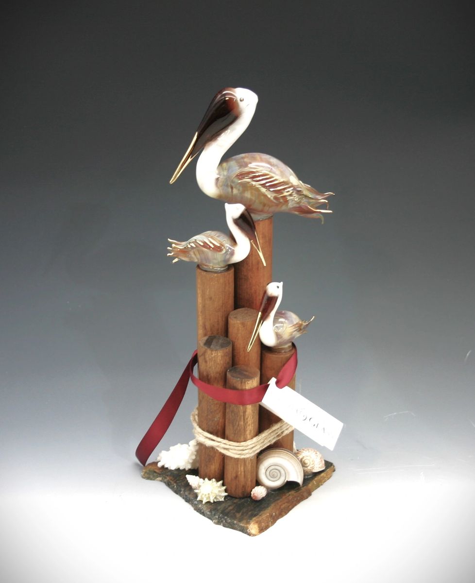 Triple Pelican on Piling