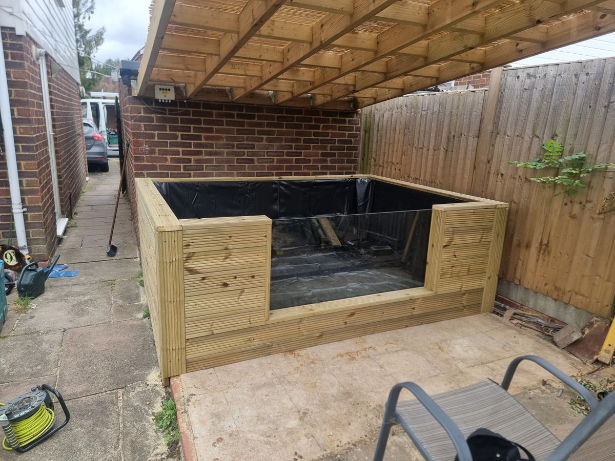 Deck pond 8ft x 6ft x 3ft with infinity viewing window.