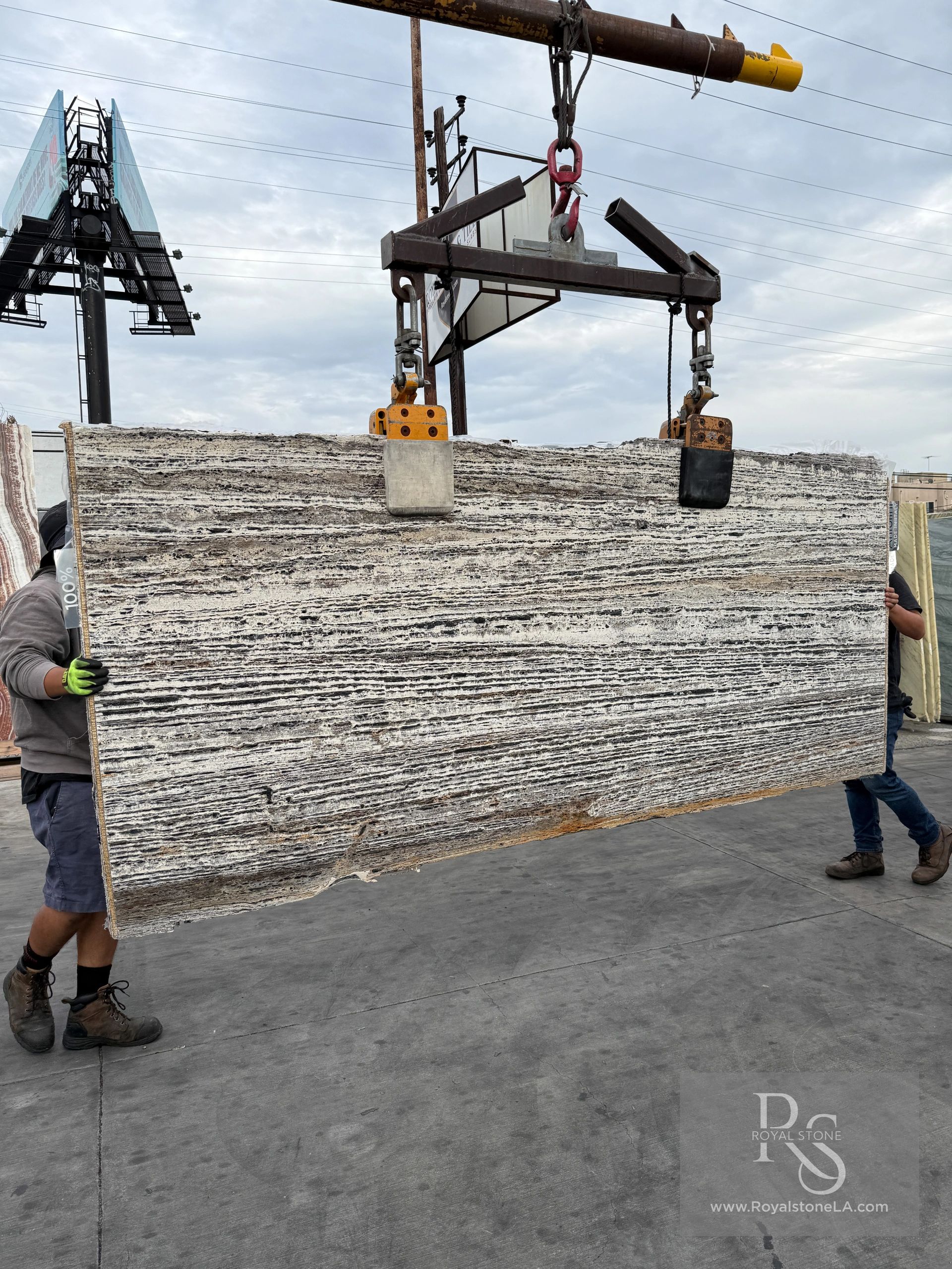 Stratos Textured Travertine Platinum Black Resin by Antolini