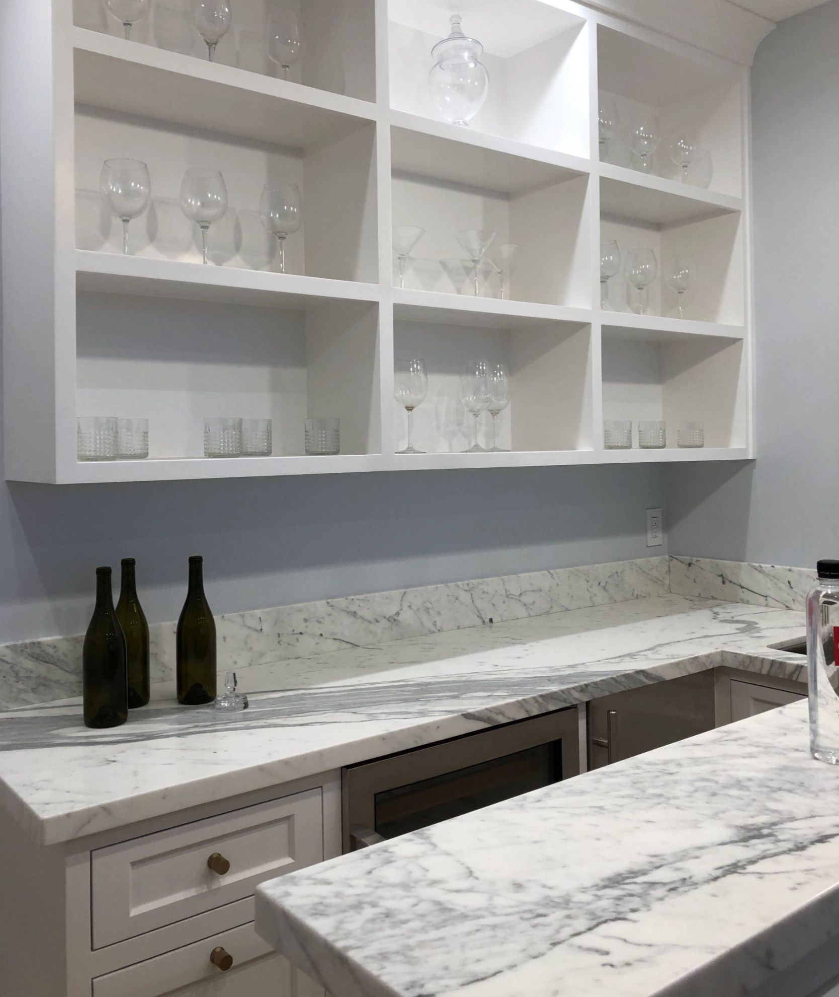 Statuary Vein Marble slabs in stalled in honed finish on a bar