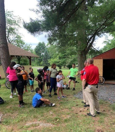 Temple University Police Officers talking Bike Safety