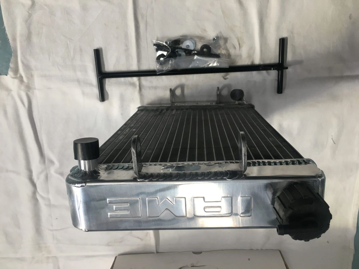 RADIATOR KIT (INCLUDES: RADIATOR, MOUNTING BRACKET, RUBBERS, BOLTS)