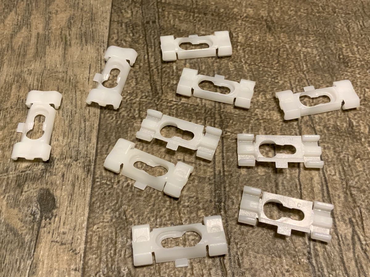 Vinyl roof lower quarter window belt reveal moulding clips