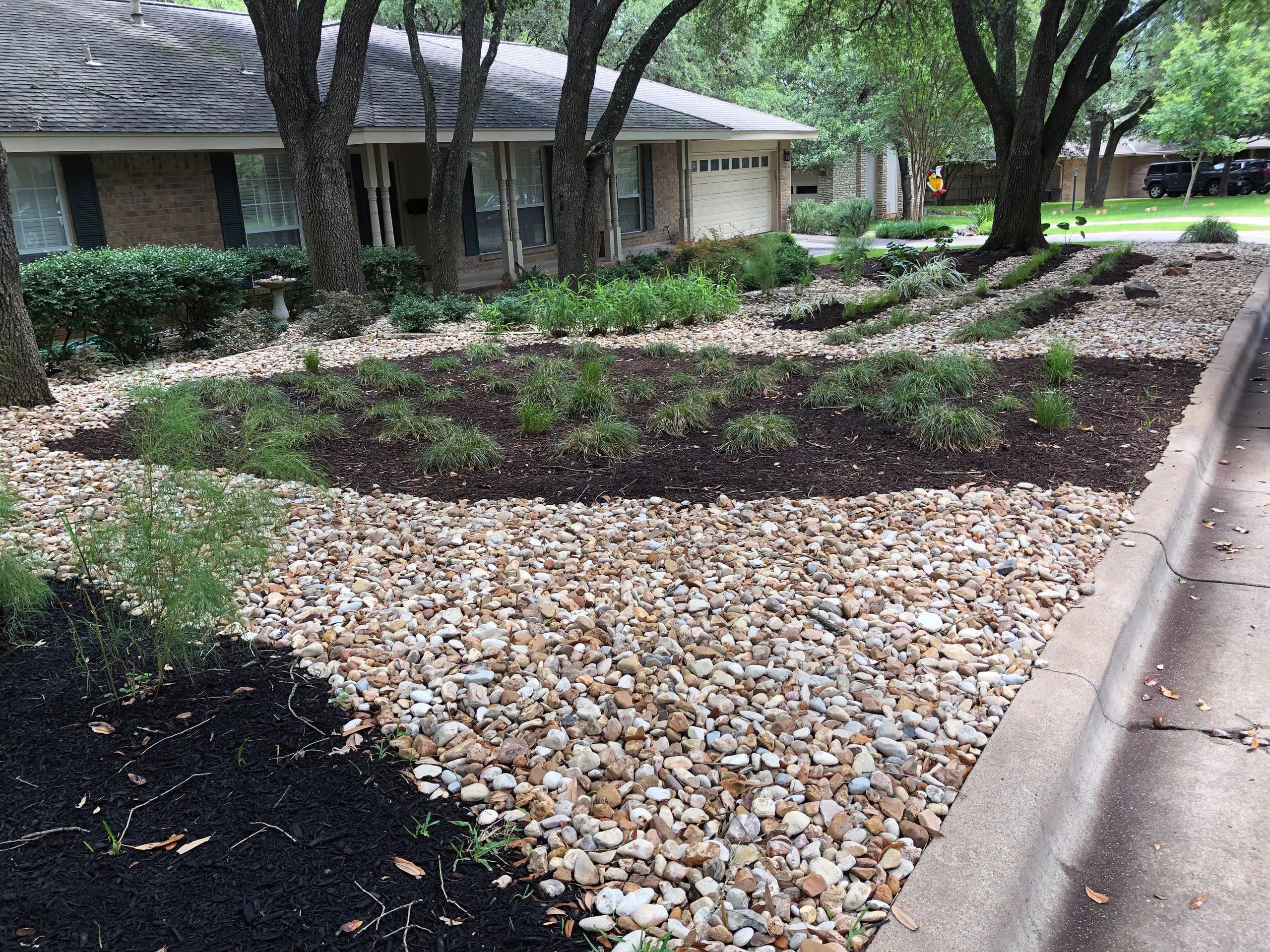 River Stone, Mulch And Shade Plants Solve Drainage Problems