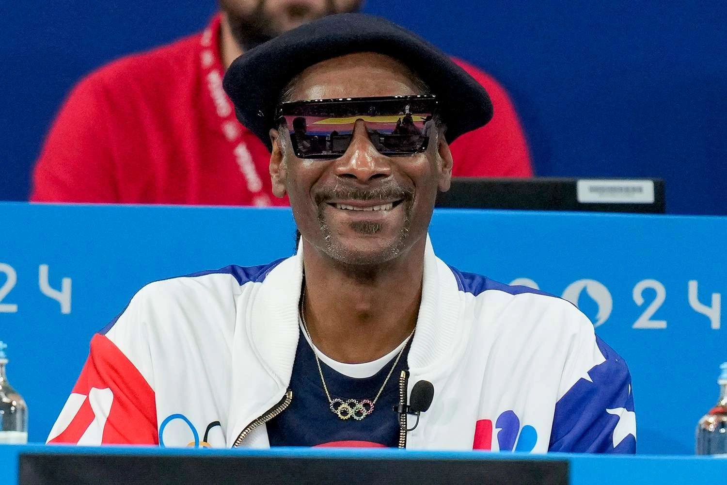 How Much Money Snoop Dogg Makes Per Day at Olympics
