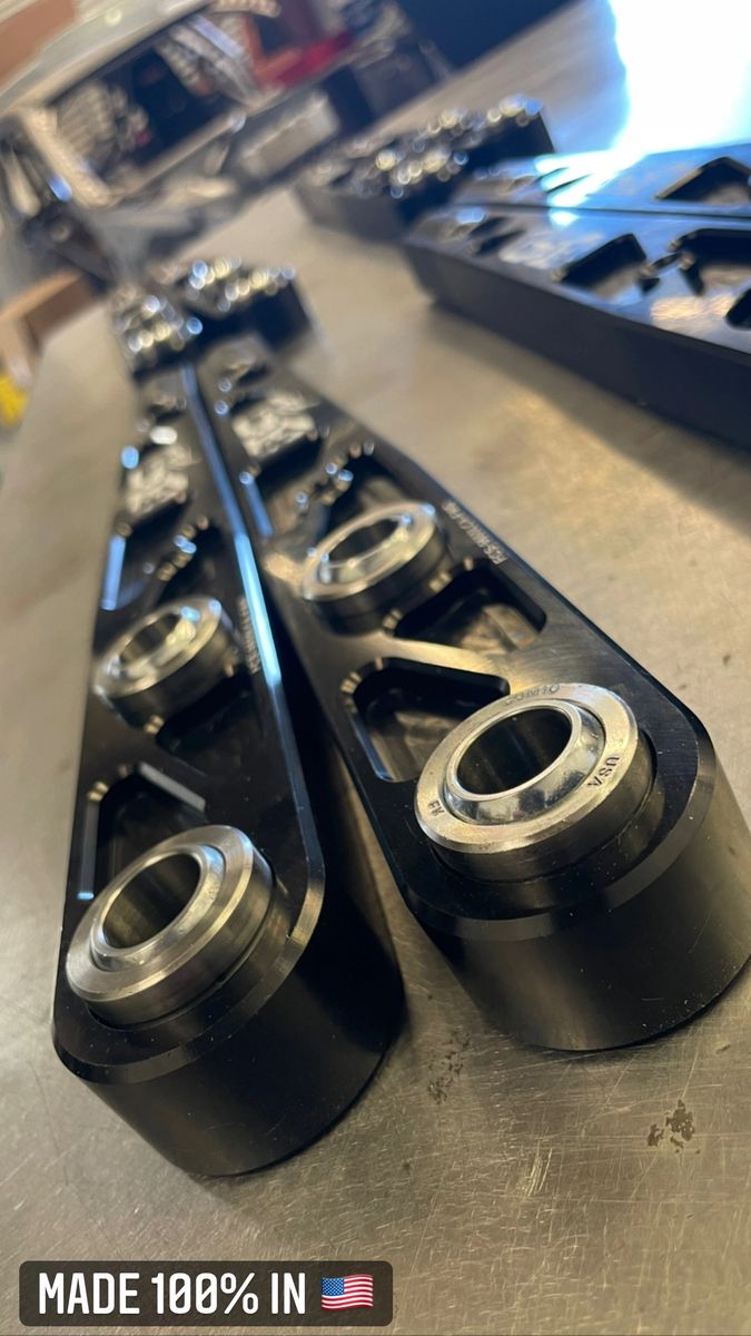 Fcs adjustable billet rear lower control arms.