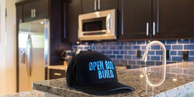 OPEN BOOK BUILD