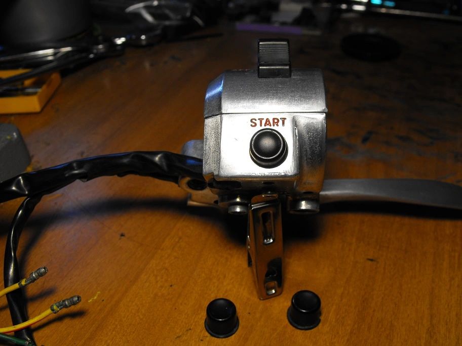 Start button. Black. Honda CT200