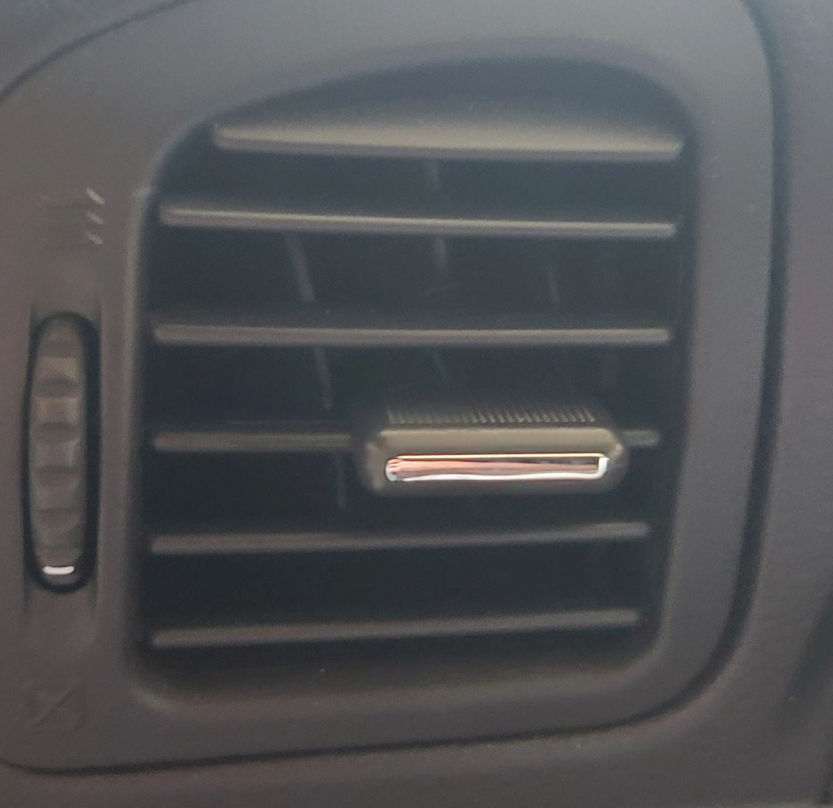 Vent tab chrome insert